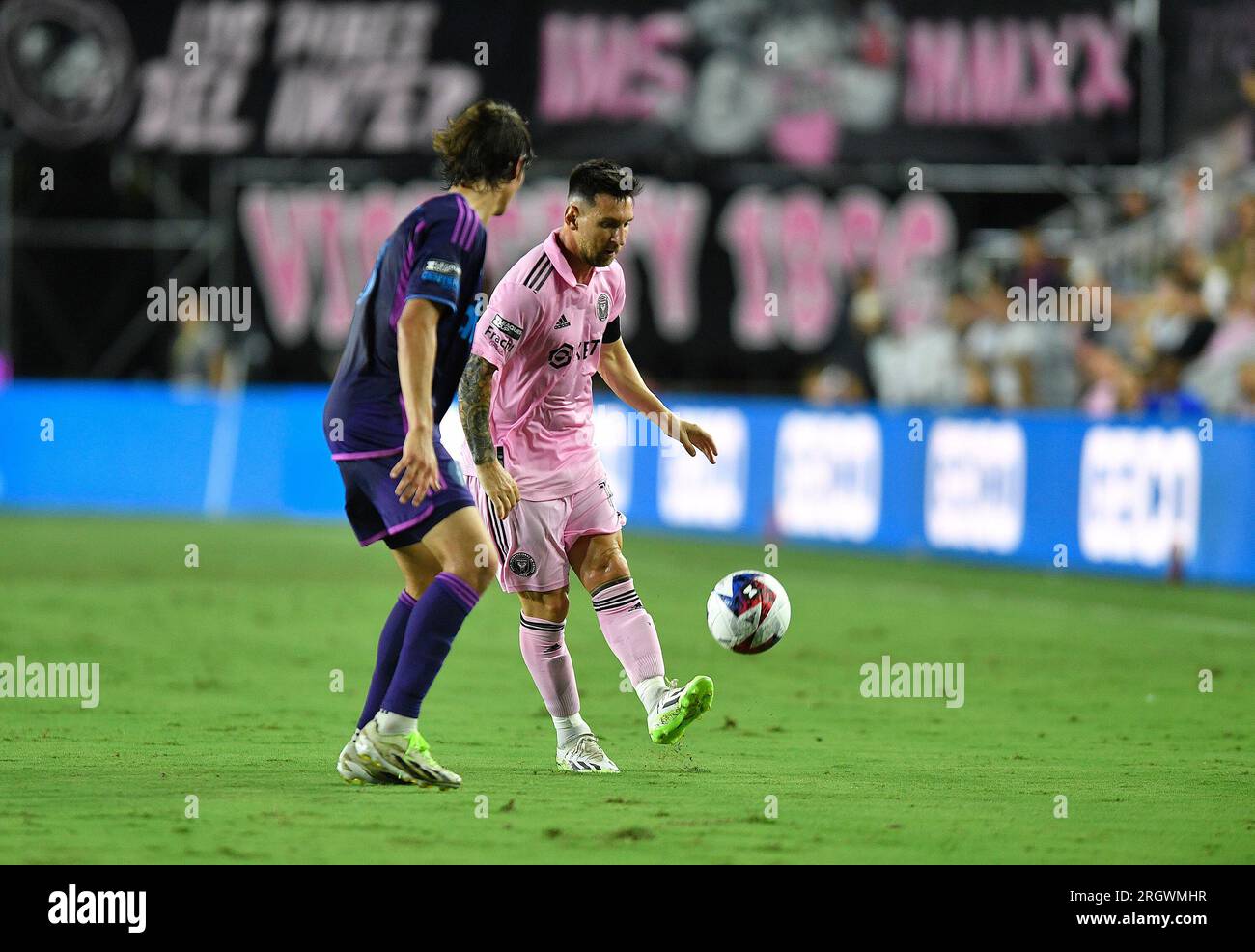 Inter Miami forward Lionel Messi passes the ball in front of Charlotte ...