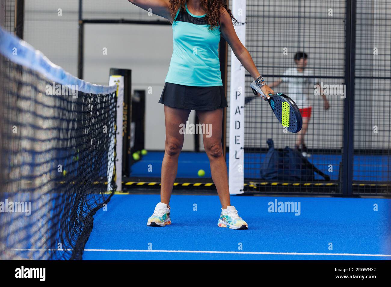 Padel Instructor Teaching the Game Techniques Stock Photo - Alamy