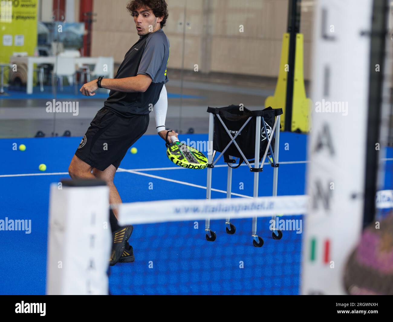 Padel Instructor Teaching the Game Techniques Stock Photo - Alamy