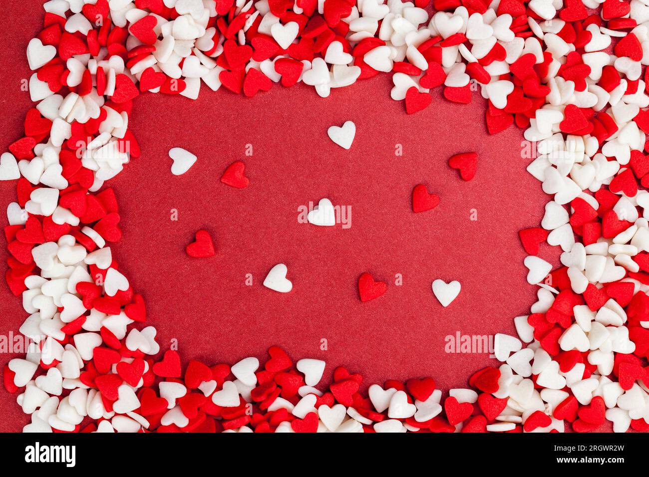 red and white sweet heart shaped candies for decorating desserts and ...