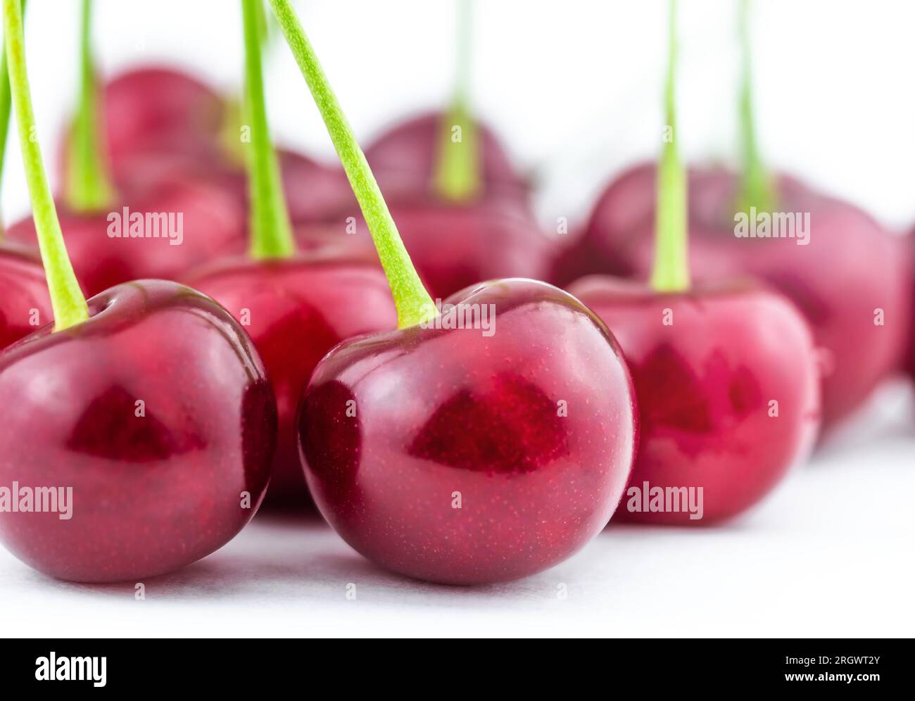 Fresh cherry, red cherry on a green stem Stock Photo - Alamy