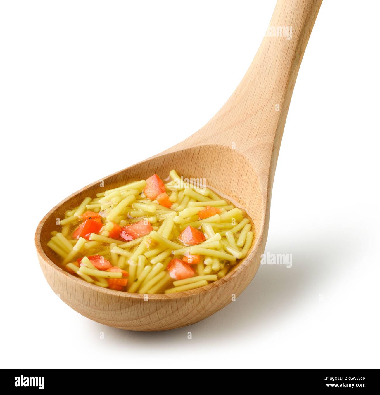 chicken noodles and vegetable soup in wooden ladle isolated on white ...