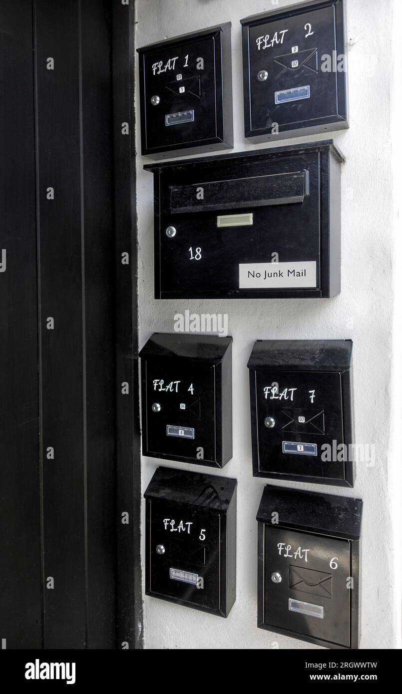 Letter boxes for apartment residences England UK Stock Photo - Alamy