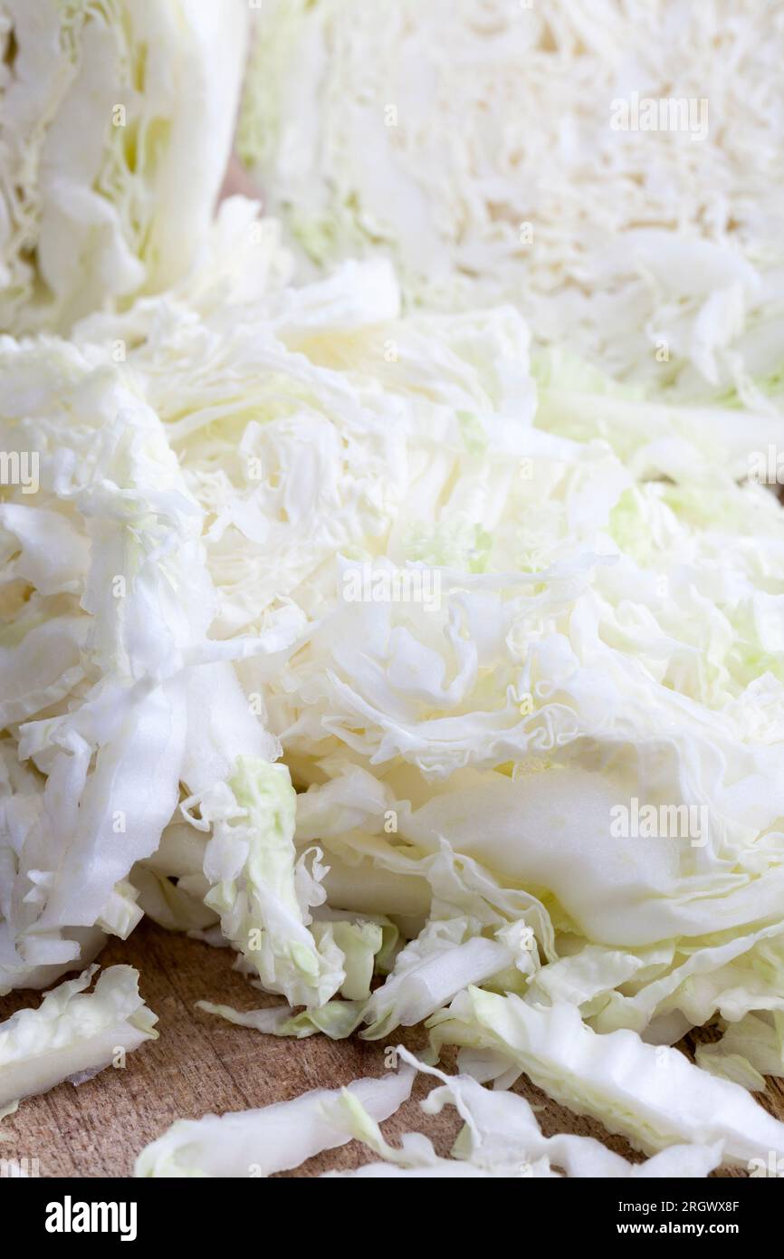 white cabbage cut into pieces, cabbage sliced and chopped for cooking ...