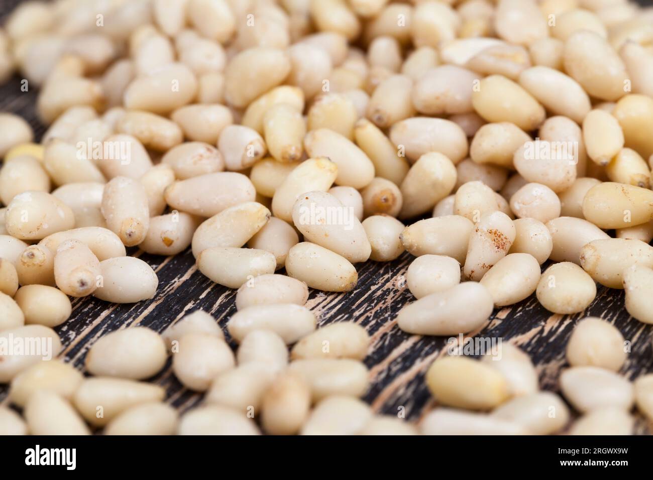 useful nuts, a part of the shell remains on the cedar nuts, peeled pine ...