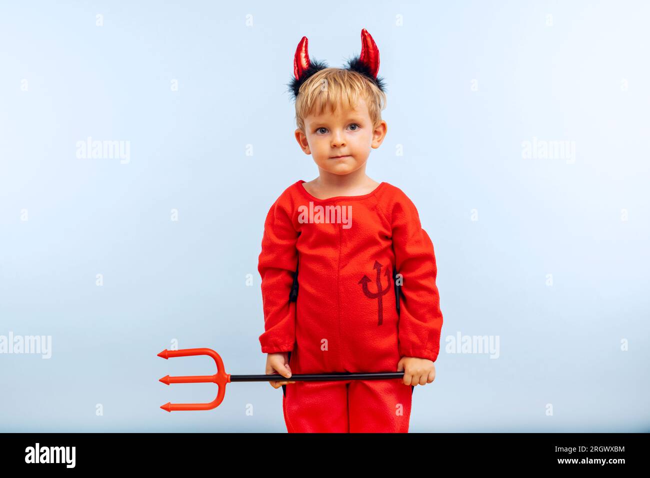 Child boy devil horns trident hi-res stock photography and images - Alamy
