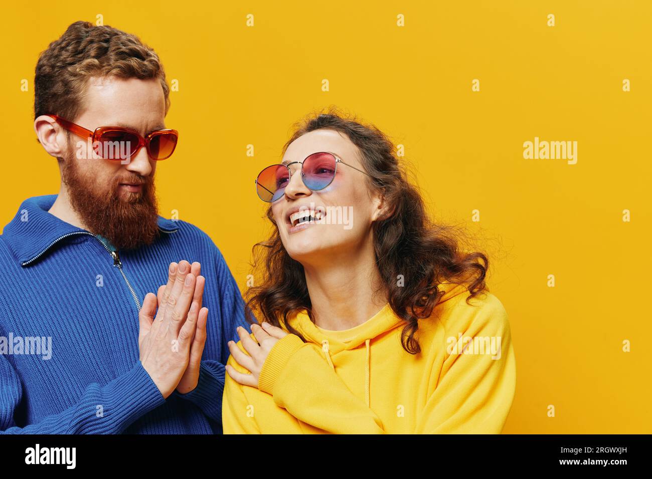 Man and woman couple smiling cheerfully and crooked with glasses, on ...