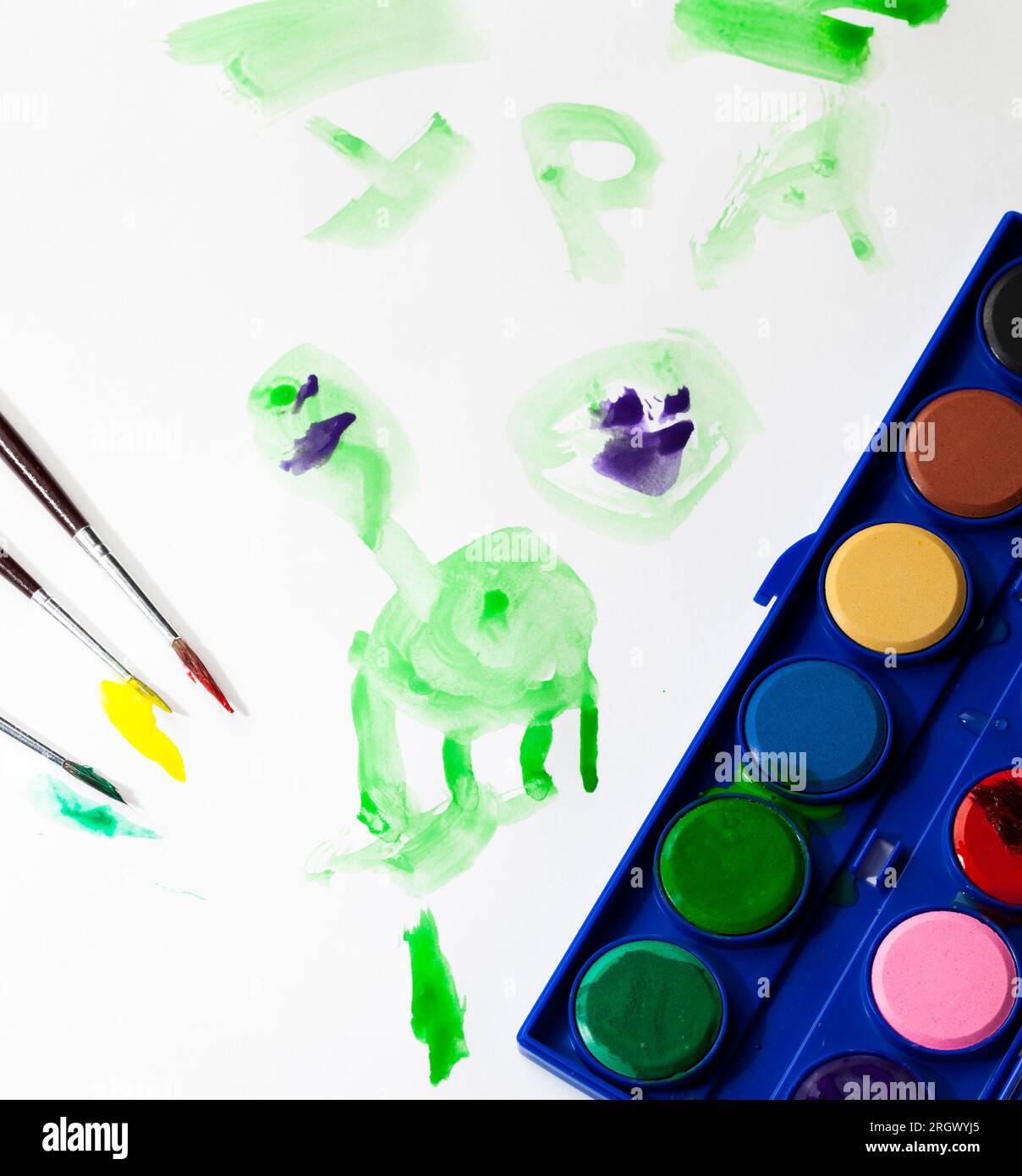 the creative process of drawing by mixing different colors of paints ...