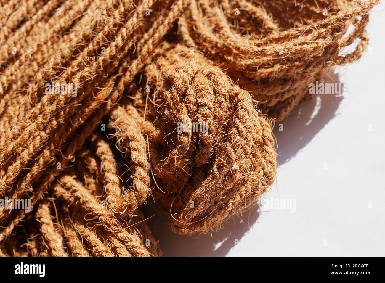 Coconut rope in a pile on white background Stock Photo - Alamy