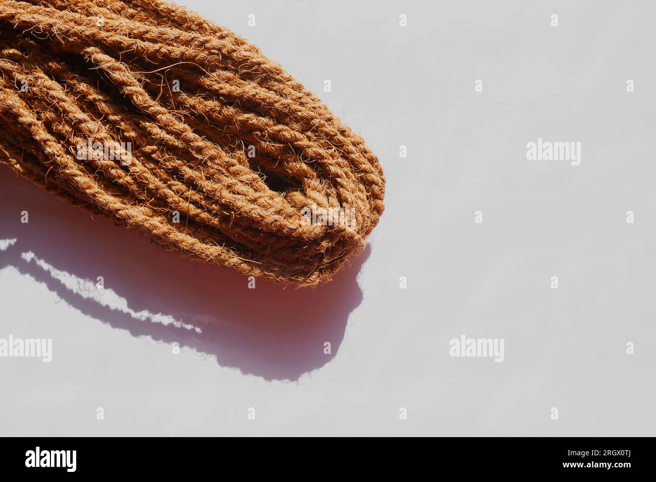 Coconut rope in a pile on white background Stock Photo - Alamy