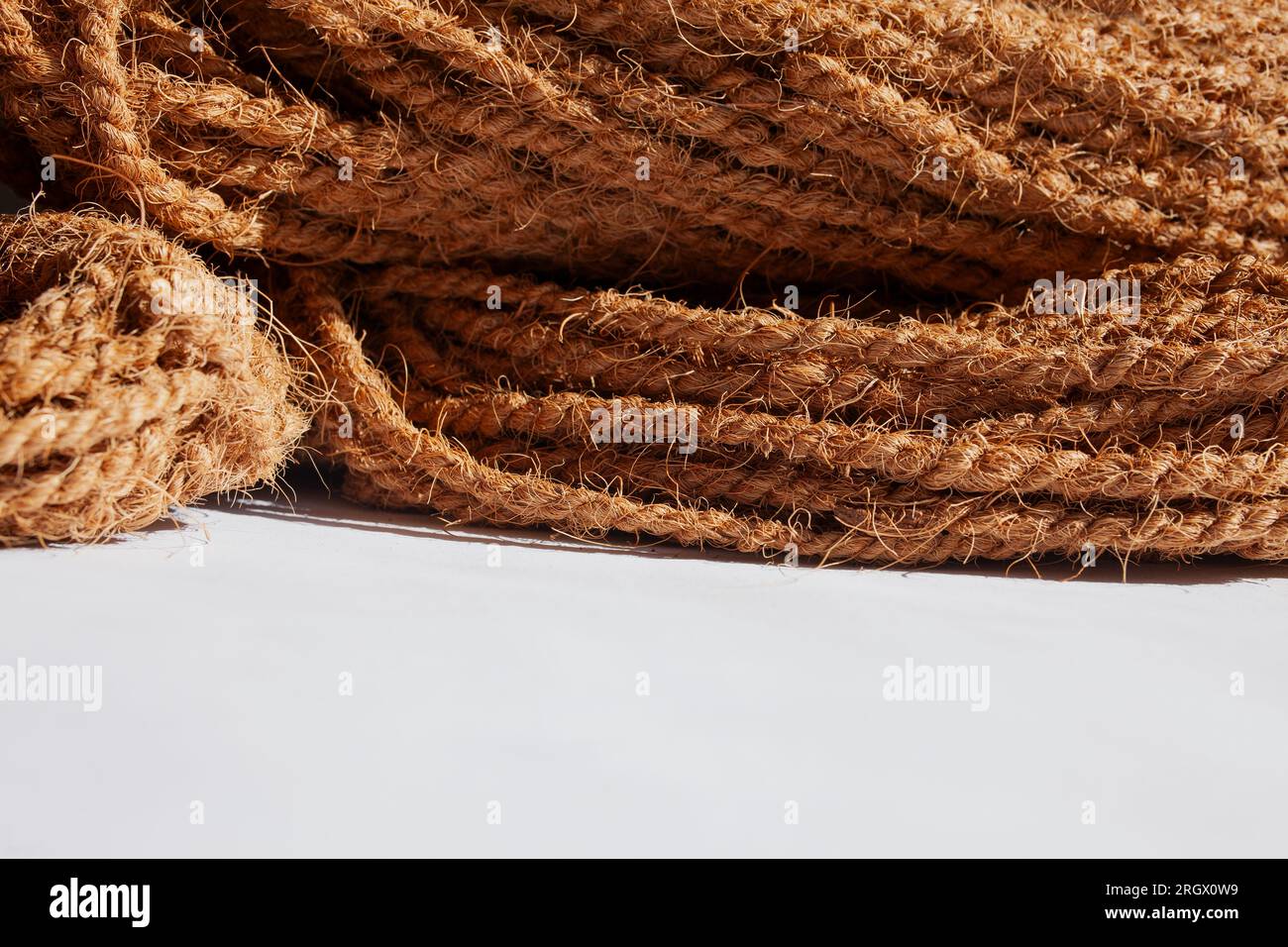 Coconut rope in a pile on white background Stock Photo - Alamy
