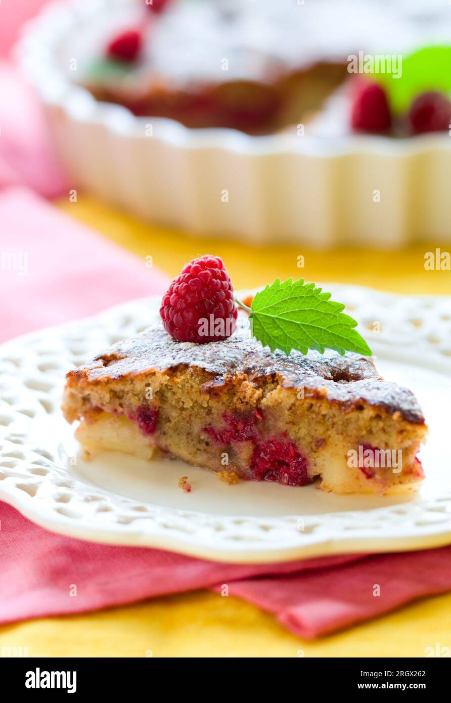 homemade raspberry cake with almond and pear Stock Photo - Alamy
