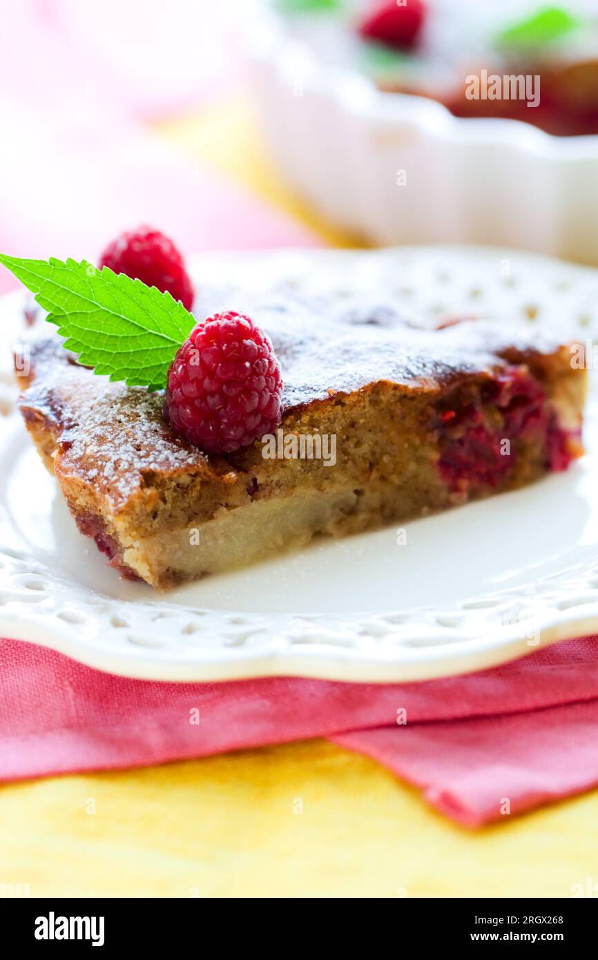 homemade raspberry cake with almond and pear Stock Photo - Alamy