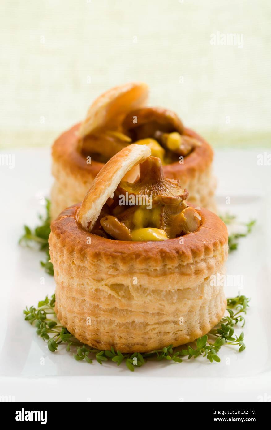 vol-au-vents puff pastry cases filled with mushrooms Stock Photo - Alamy