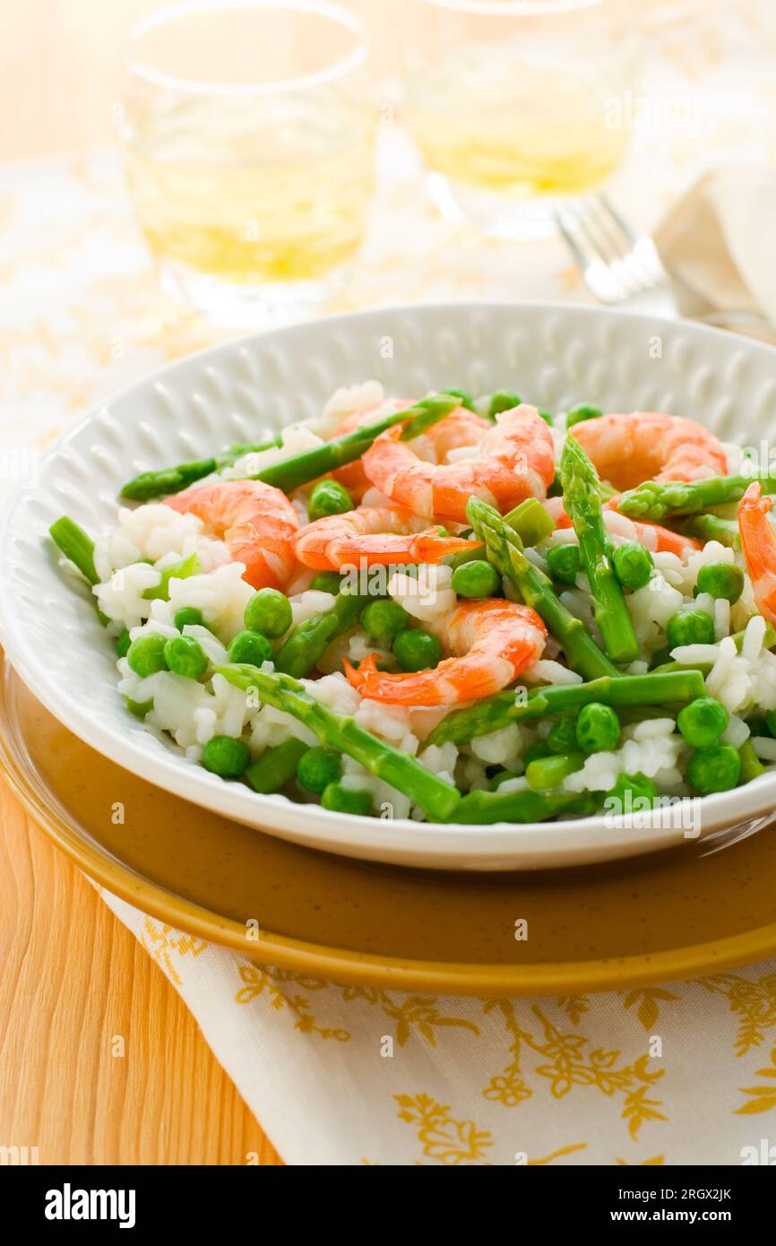 italian risotto with asparagus, shrimp and green pea Stock Photo - Alamy