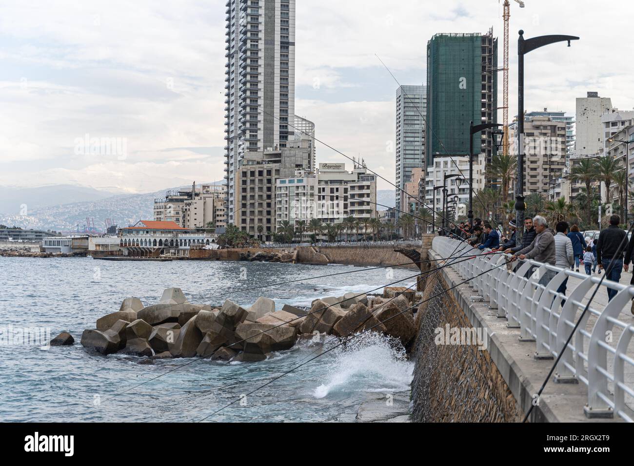 Men fishing from the corniche in Beirut, Lebanon Stock Photo - Alamy