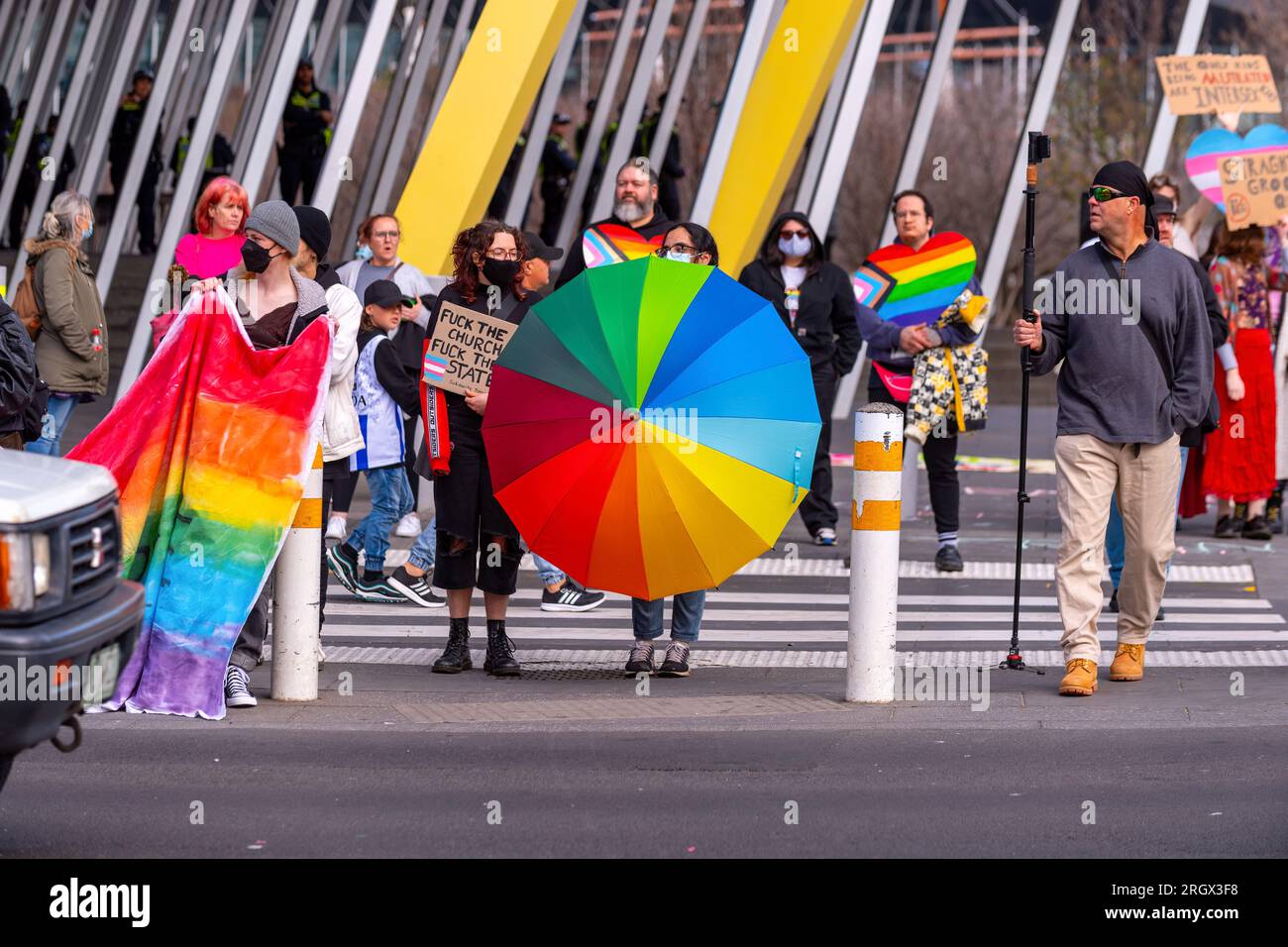 Pro-LGBT protesters with rainbow flags, signs and umbrellas during ...