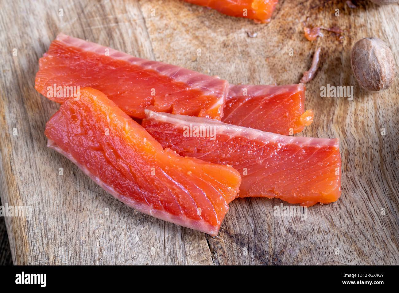 red salted salmon fish meat on a chopping board, salted salmon fish ...