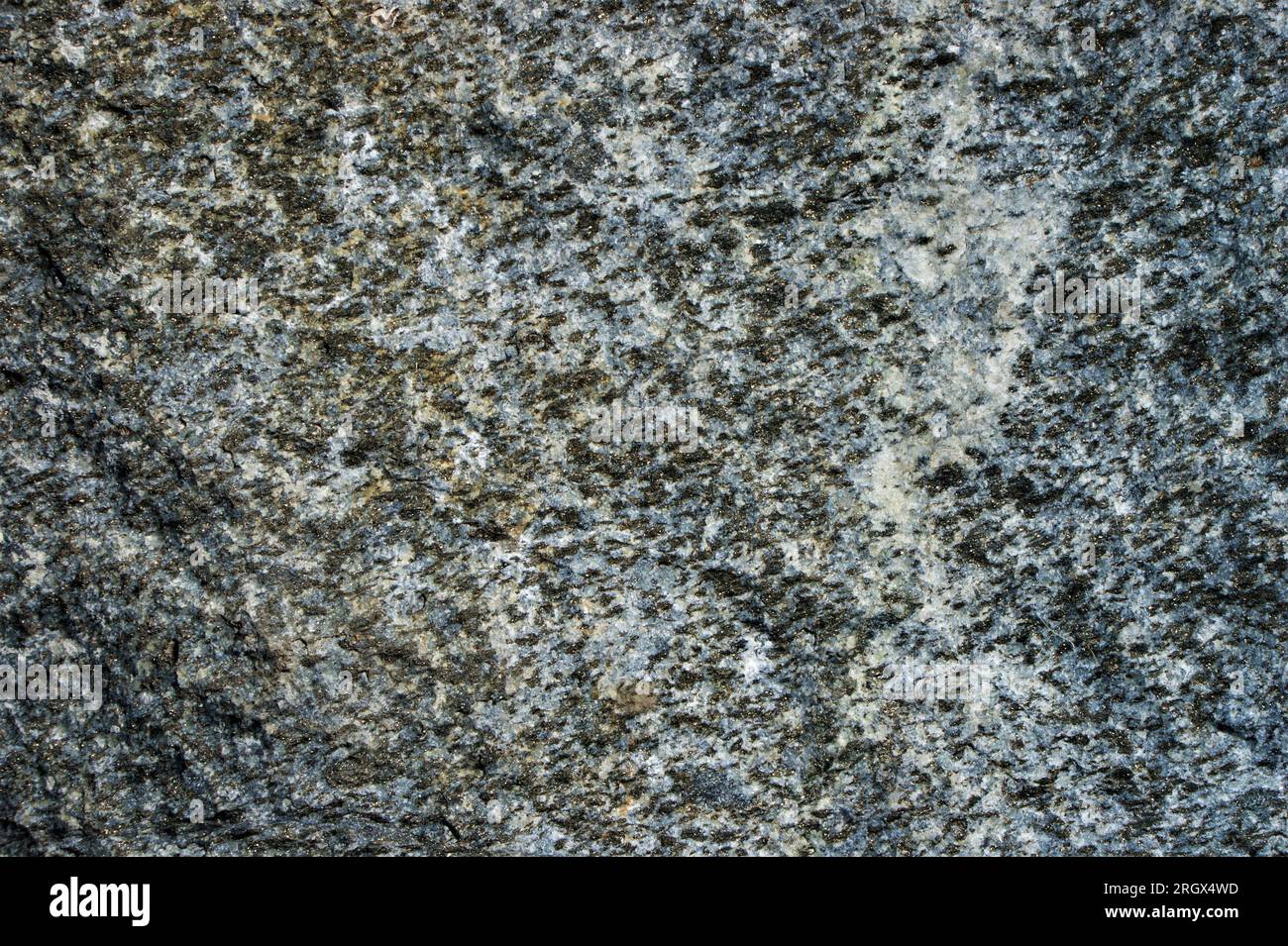 Boulder structure close-up. Gray background Stock Photo - Alamy