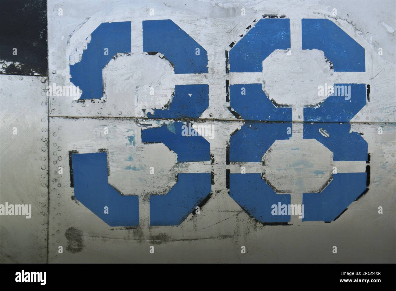 Number 38 written in blue. The number 38 on the fuselage of an old ...