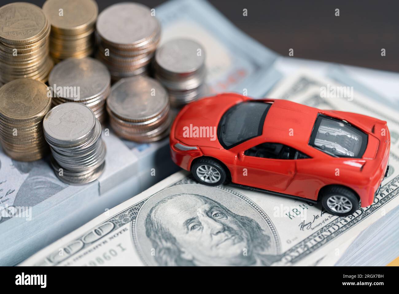 Miniature car model and Financial statement with coins. Finance and car ...
