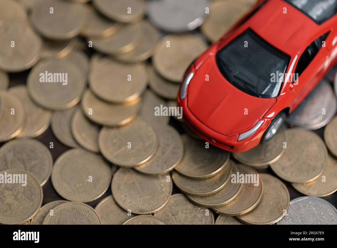 Miniature car model and Financial statement with coins. Finance and car ...
