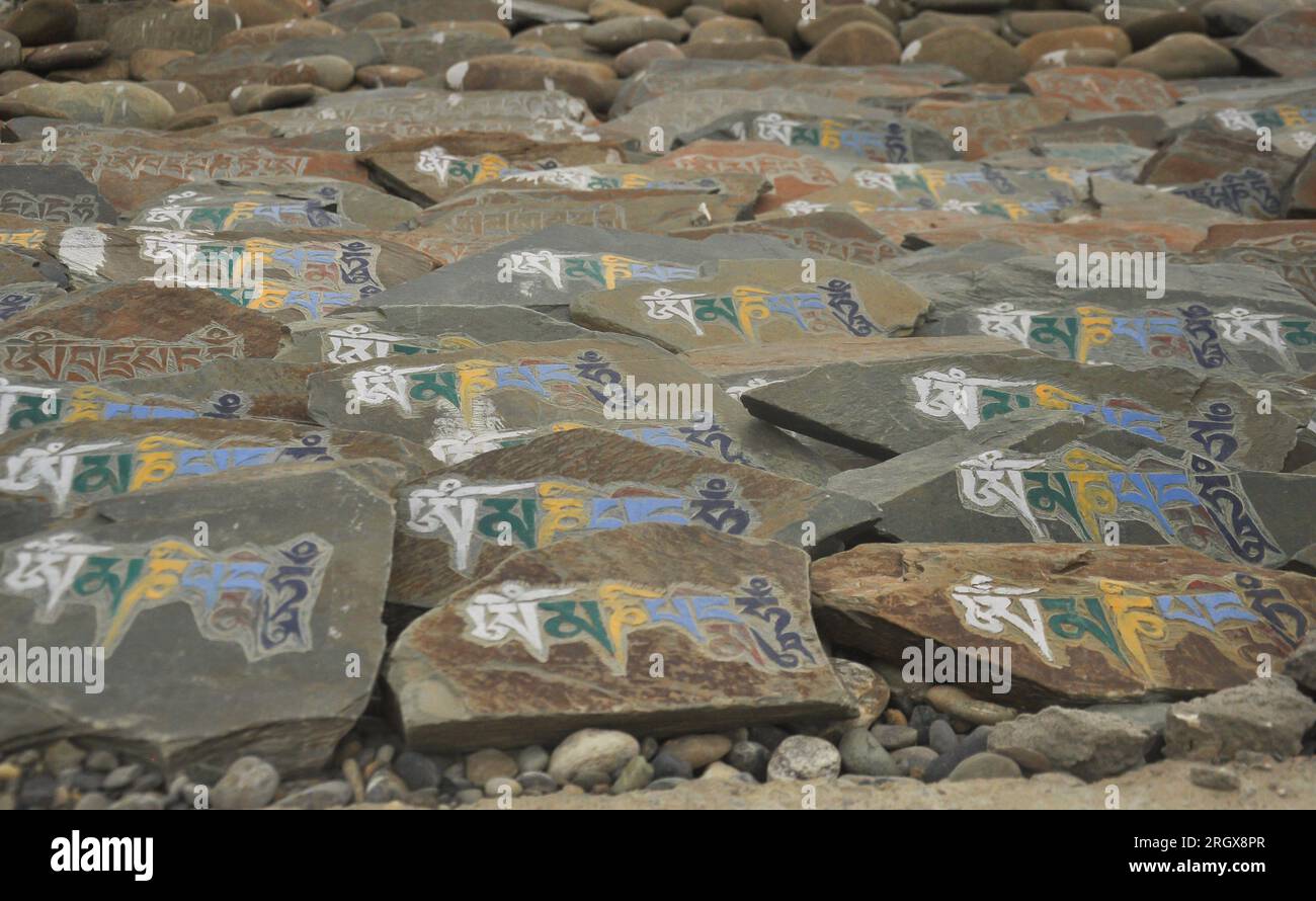 Mani stones with Buddhist mantra "Om Mani Padme Hum" in Zanskar Valley ...