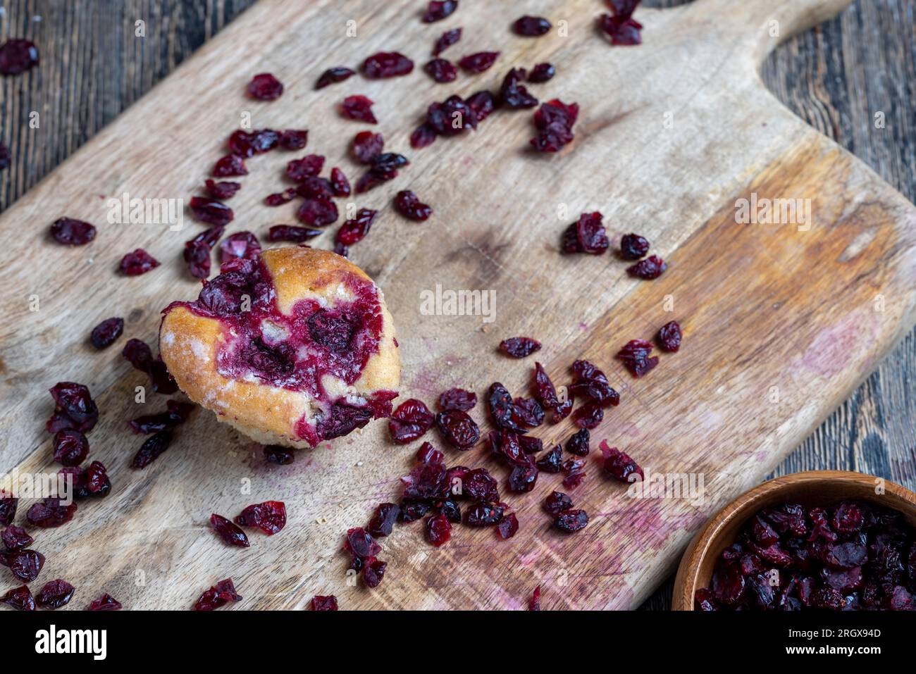 wheat pastries with red cherry strawberry filling on a board, dried ...