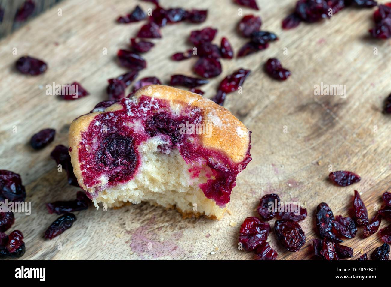 wheat pastries with red cherry strawberry filling on a board, dried ...