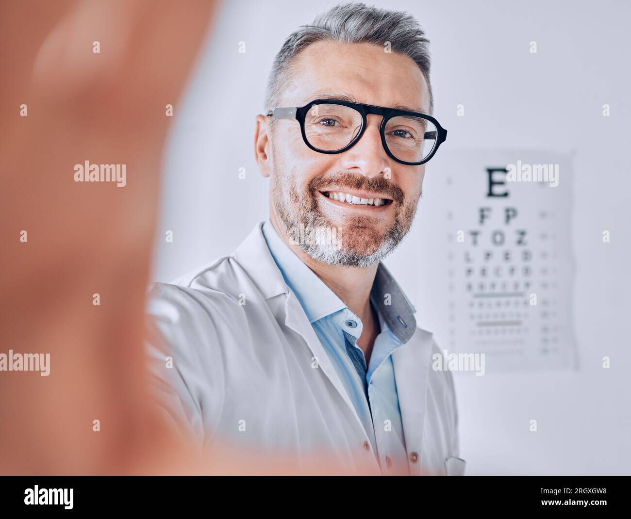 Selfie, glasses and eye exam with an optometrist man in his office for ...