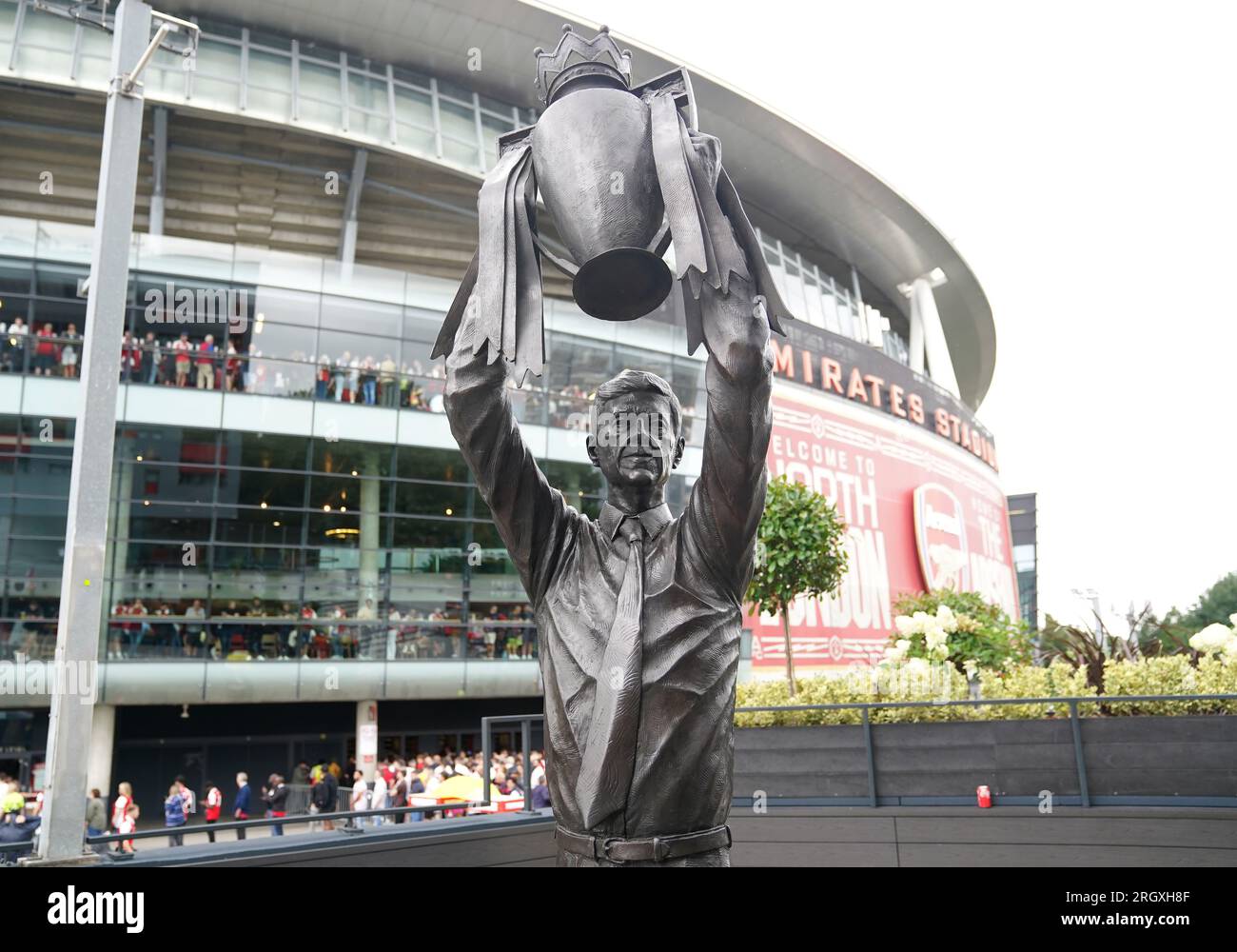 A statue of former Arsenal manager Arsene Wenger with the Premier ...
