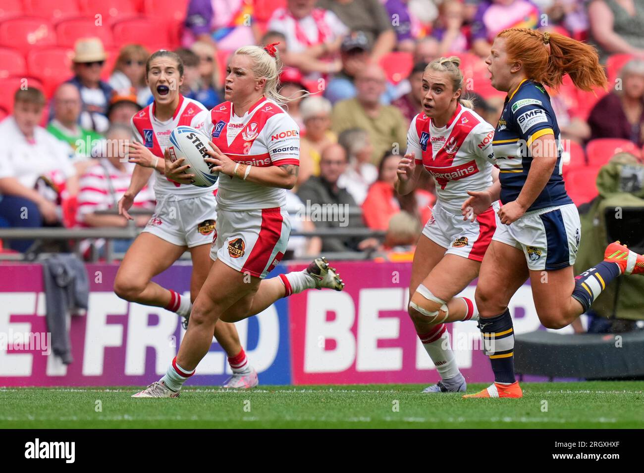 Eboni Partington #3 of St. Helens makes a break during the Betfred ...