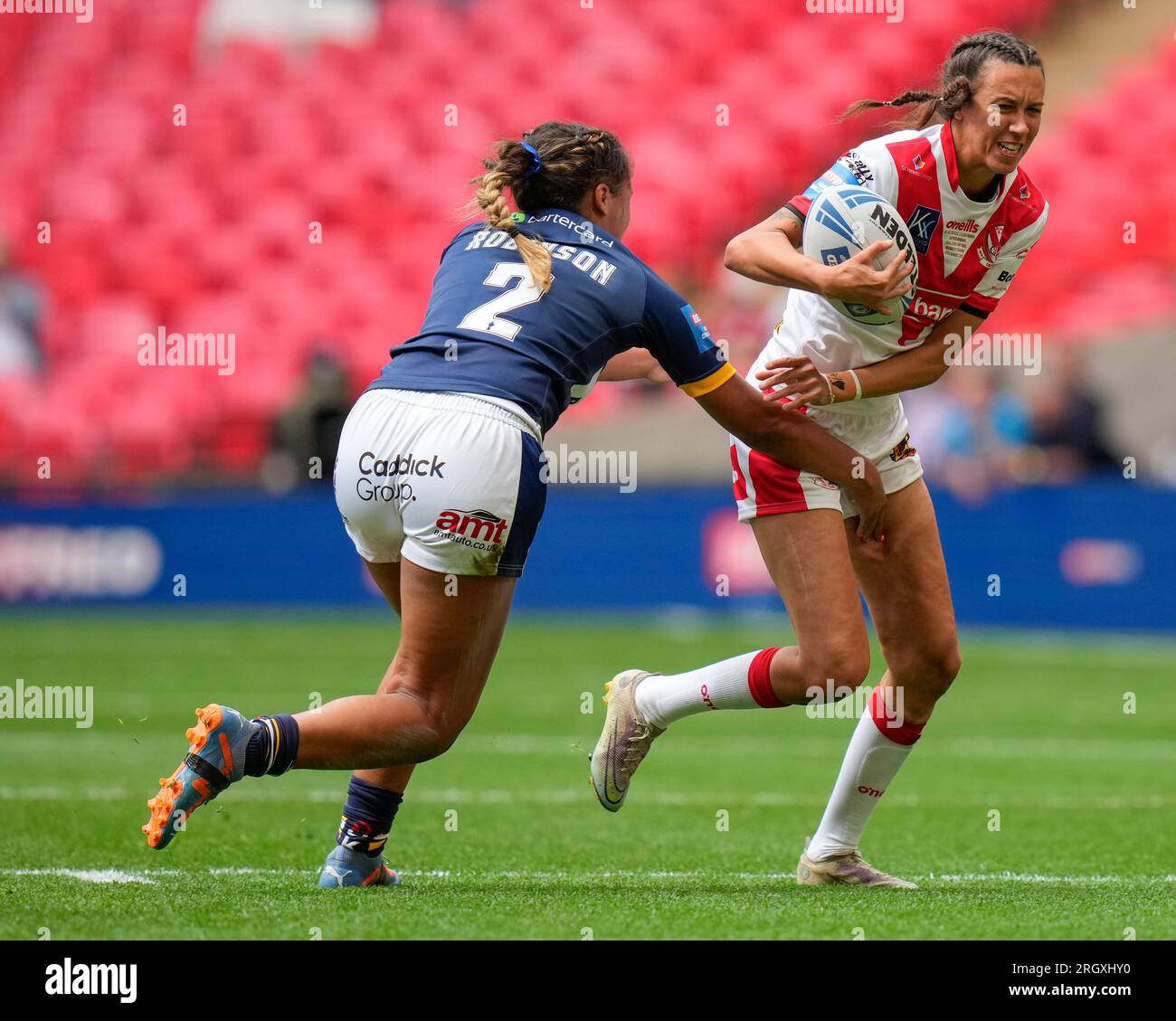 Zoe Harris #6 of St. Helens breaks past Sophie Robinson #2 of Leeds ...