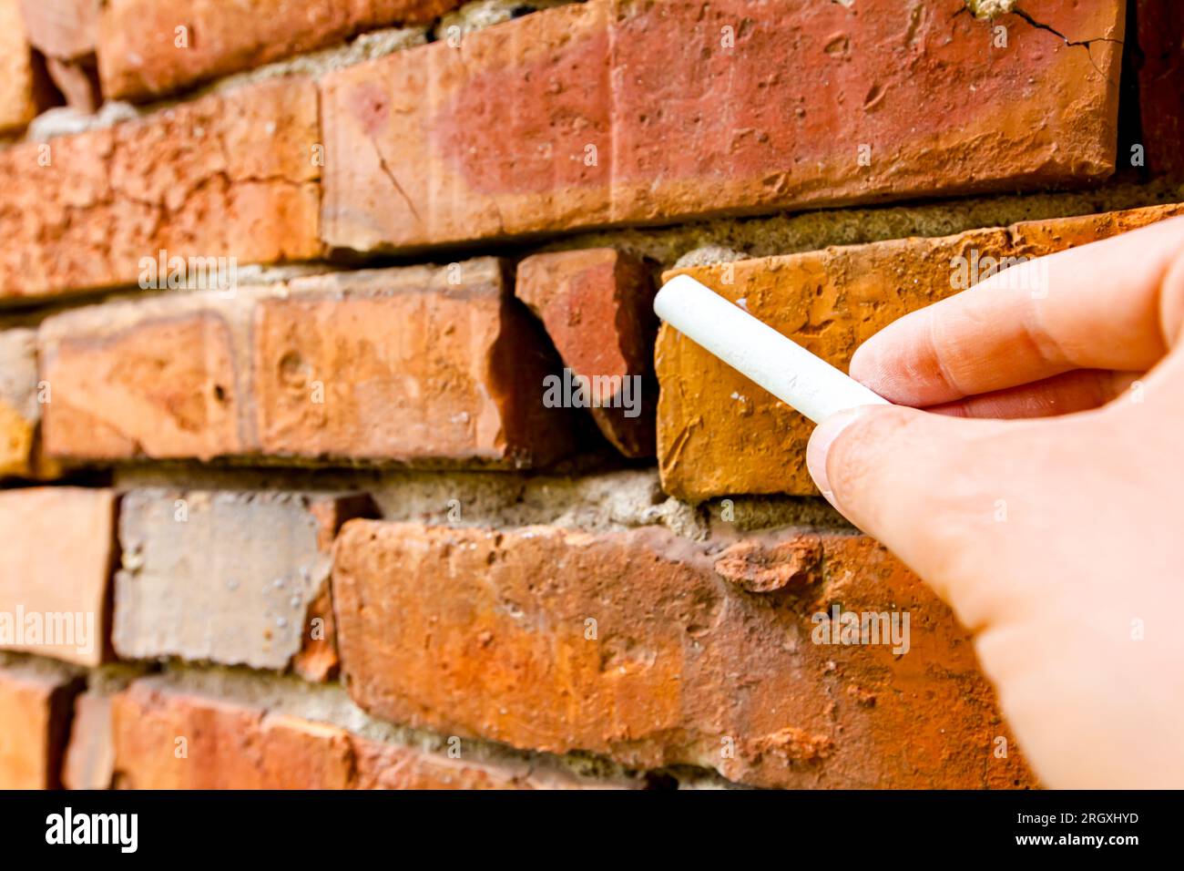 White Chalk Written On Red Brick at Amelia Woodhouse blog