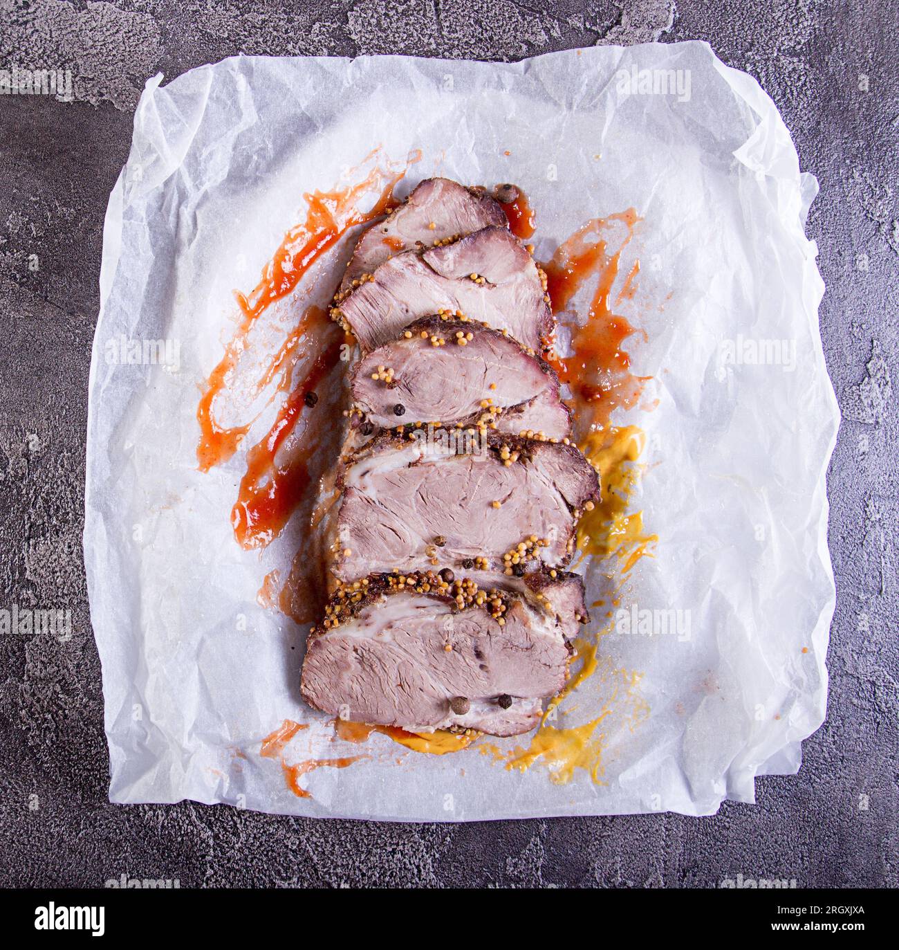 Pieces of oven baked meet pork, top view Stock Photo - Alamy