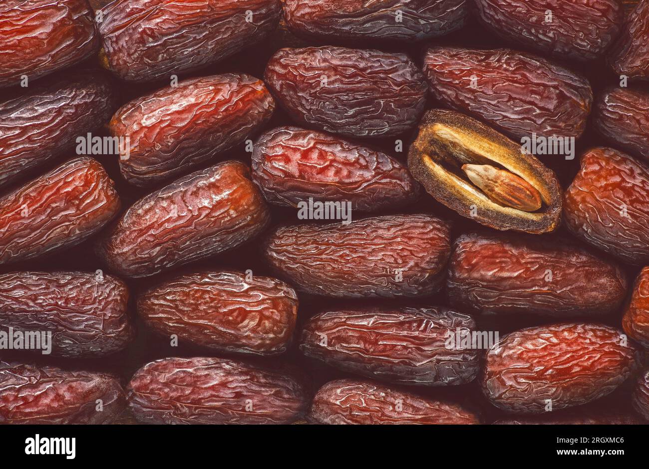 Close up for delicious organic Medjool dates. They have a sweet caramel ...