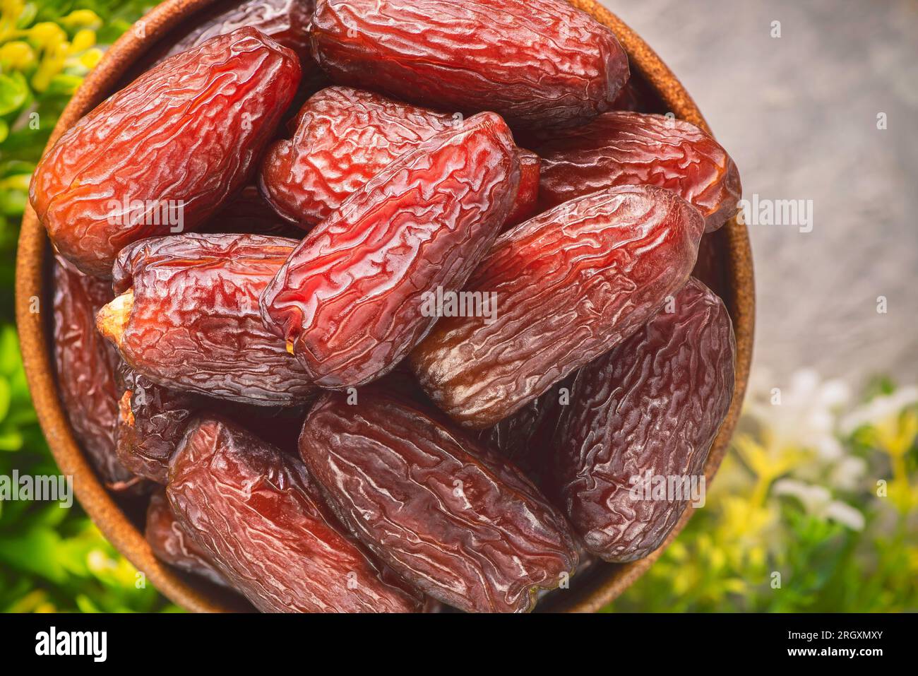 Close up for delicious organic Medjool dates. They have a sweet caramel ...