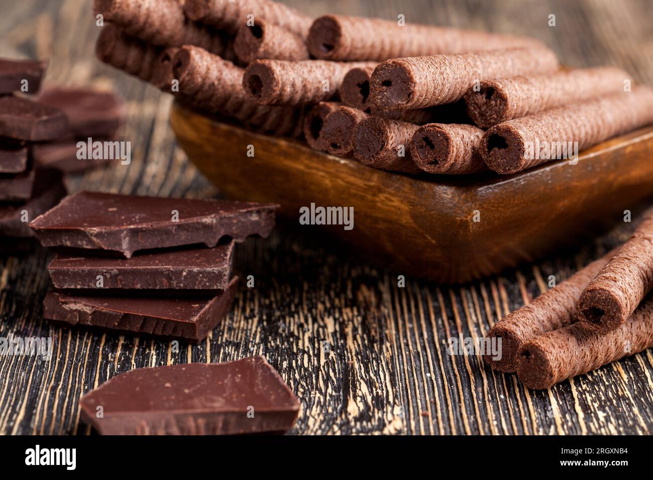 chocolate tubes with chocolate filling, dessert of chocolate waffle ...