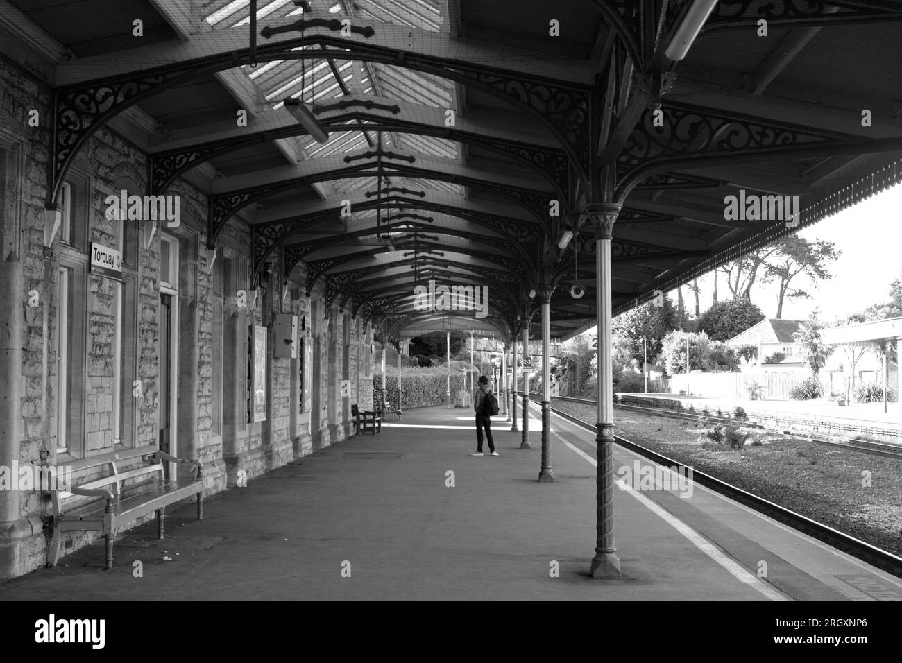 Black and white image of Dawlish train station with the line running ...