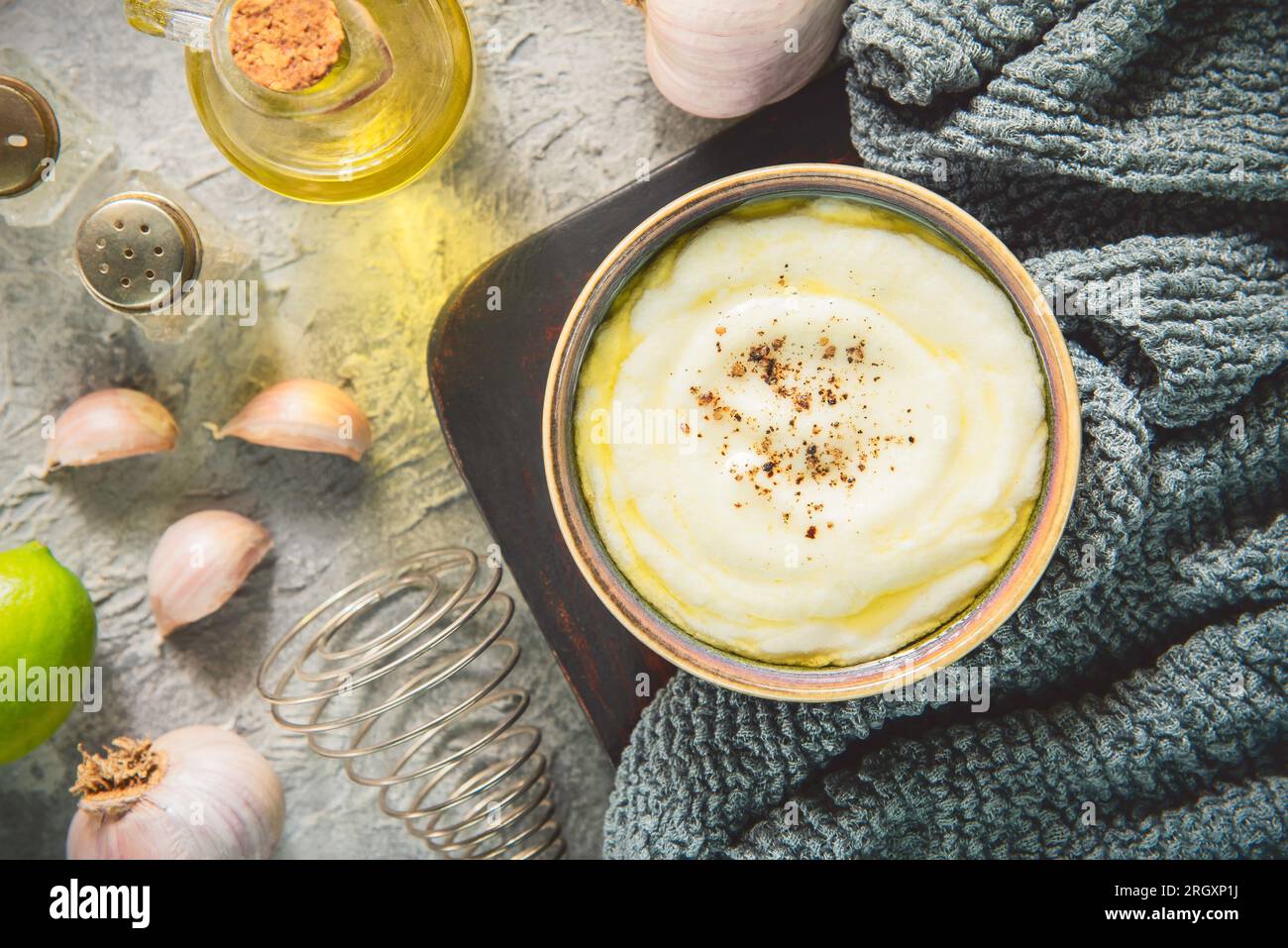 Arabic Cuisine; Traditional Lebanese garlic dip "Toum or Toumya". It is ...