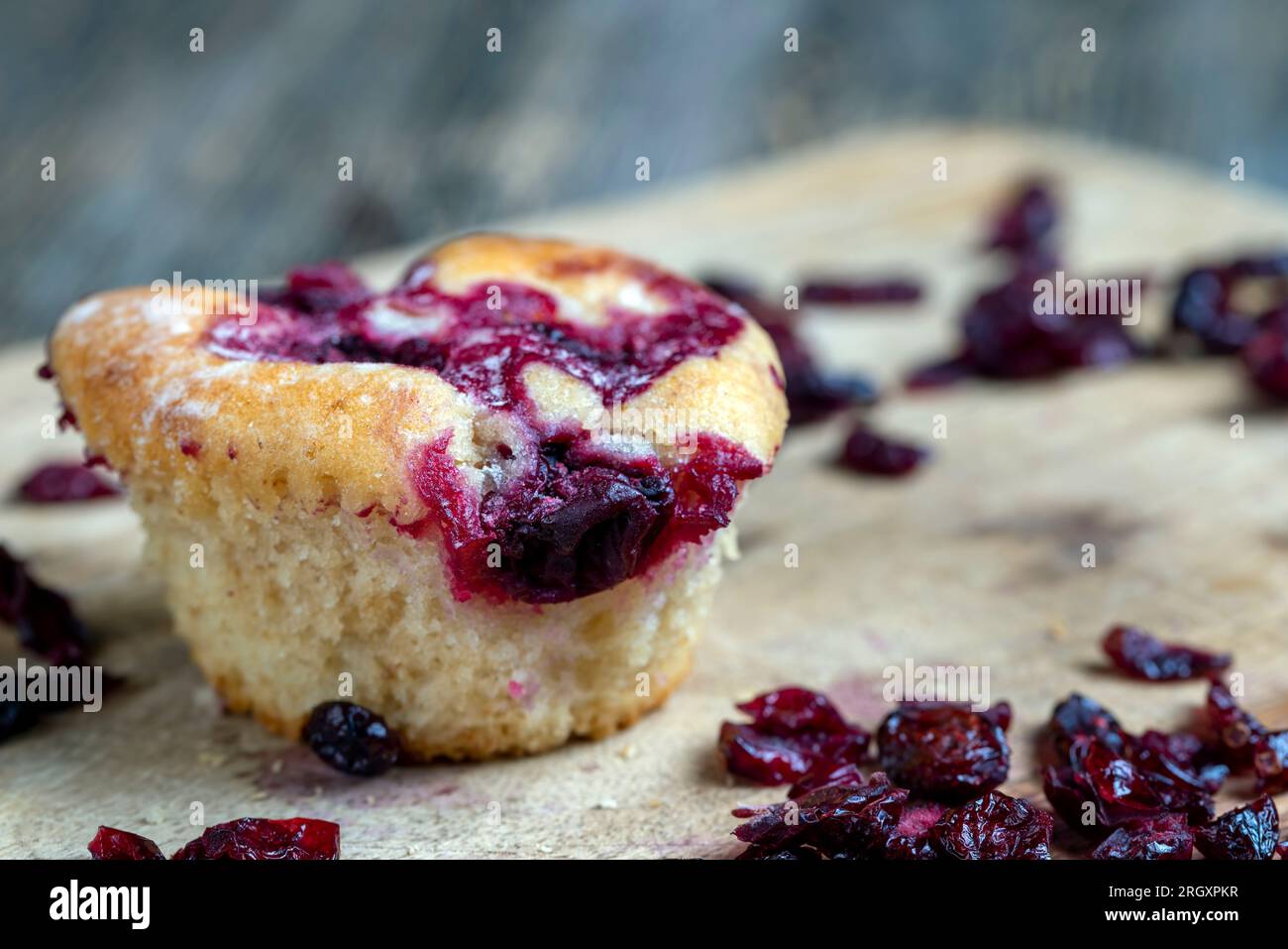 wheat pastries with red cherry strawberry filling on a board, dried ...