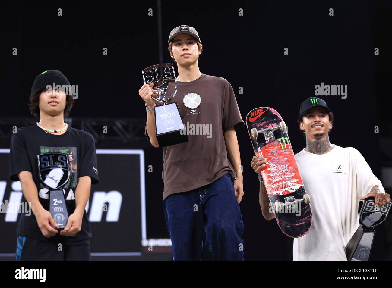 (L-R) Japan's Daiki Ikeda, 2nd, Yuto Horigome, winner, and Nyjah Huston ...