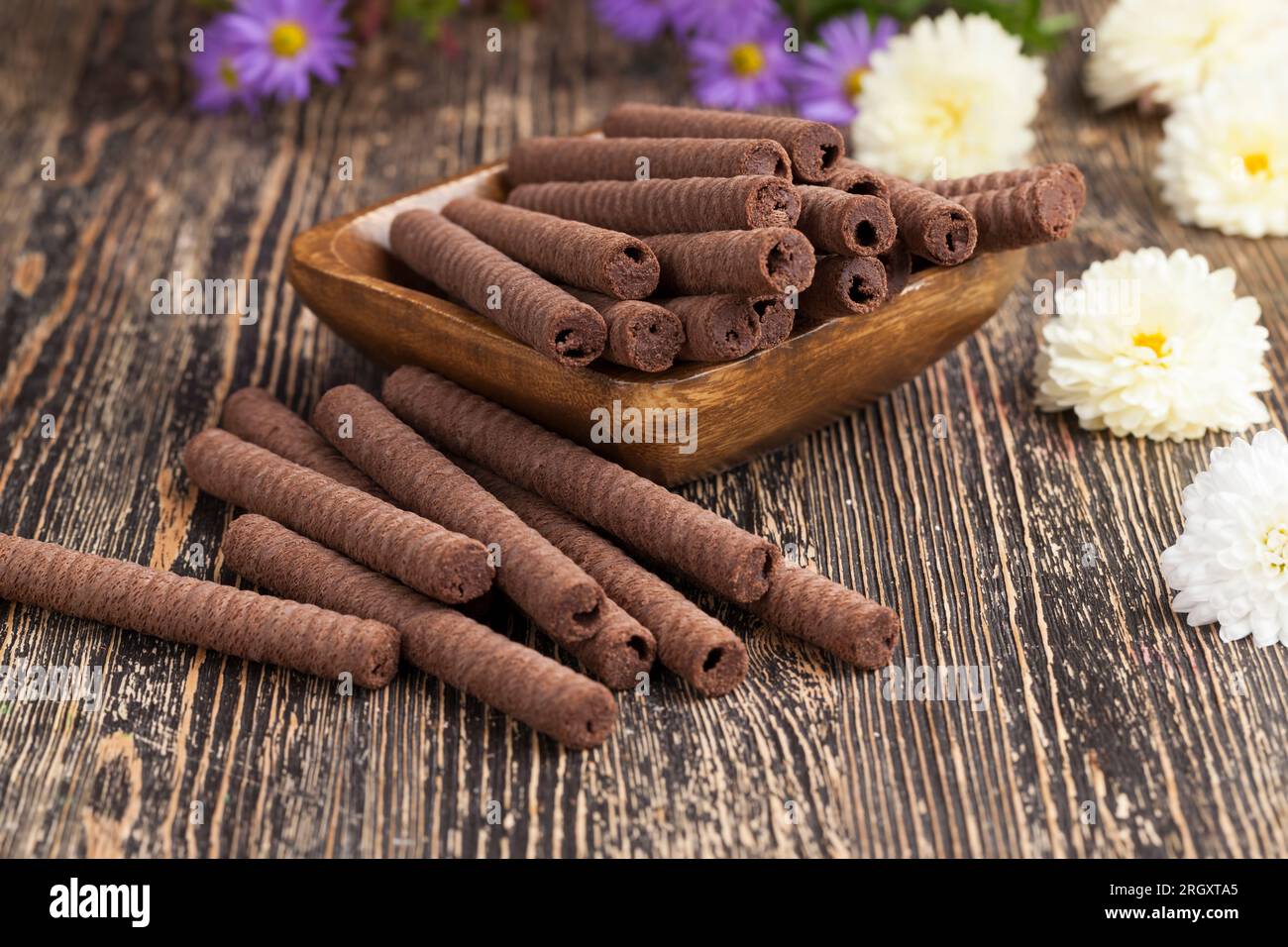 chocolate tubes with chocolate filling, dessert of chocolate waffle ...