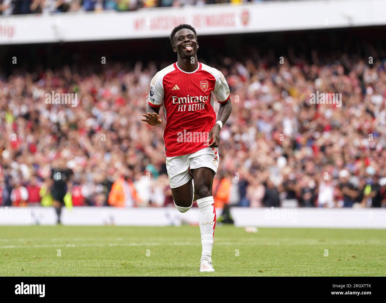 Arsenal's Bukayo Saka celebrates scoring their side's second goal of ...