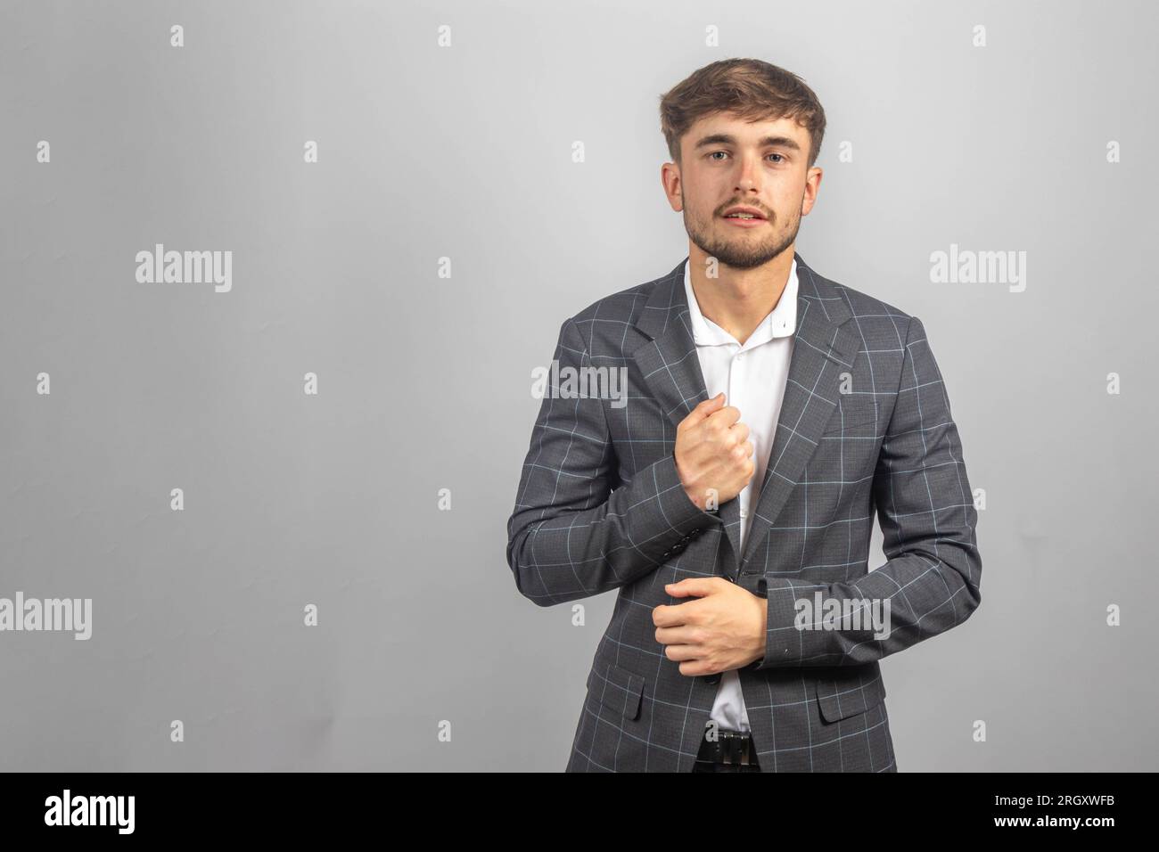 Businessman adjusting his cuffs hi-res stock photography and images - Alamy