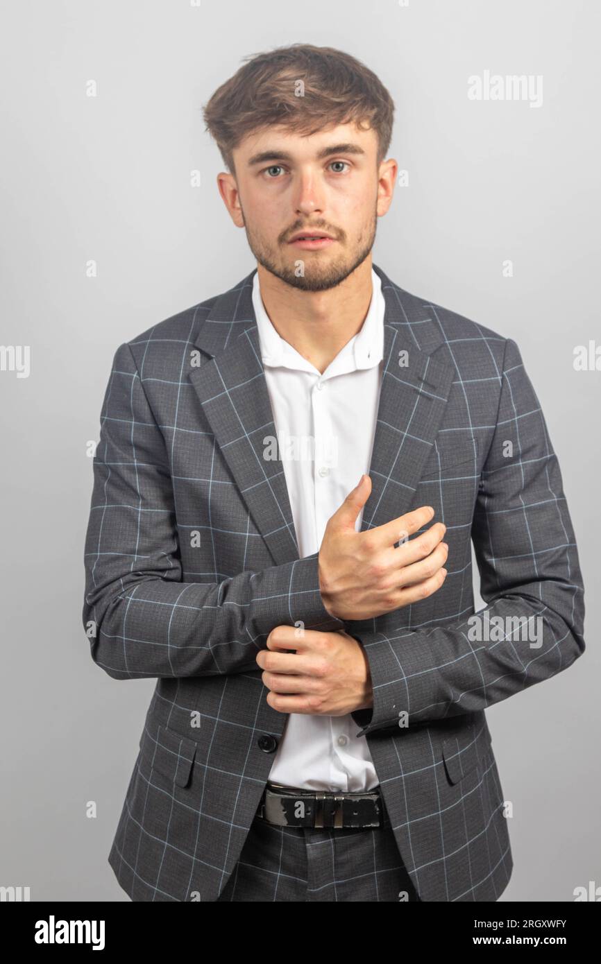 Businessman adjusting his cuffs hi-res stock photography and images - Alamy