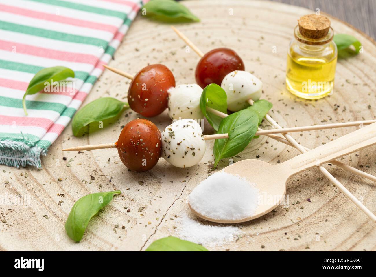 Italian food. Capresse salad skewers, extra virgin olive oil and salt ...