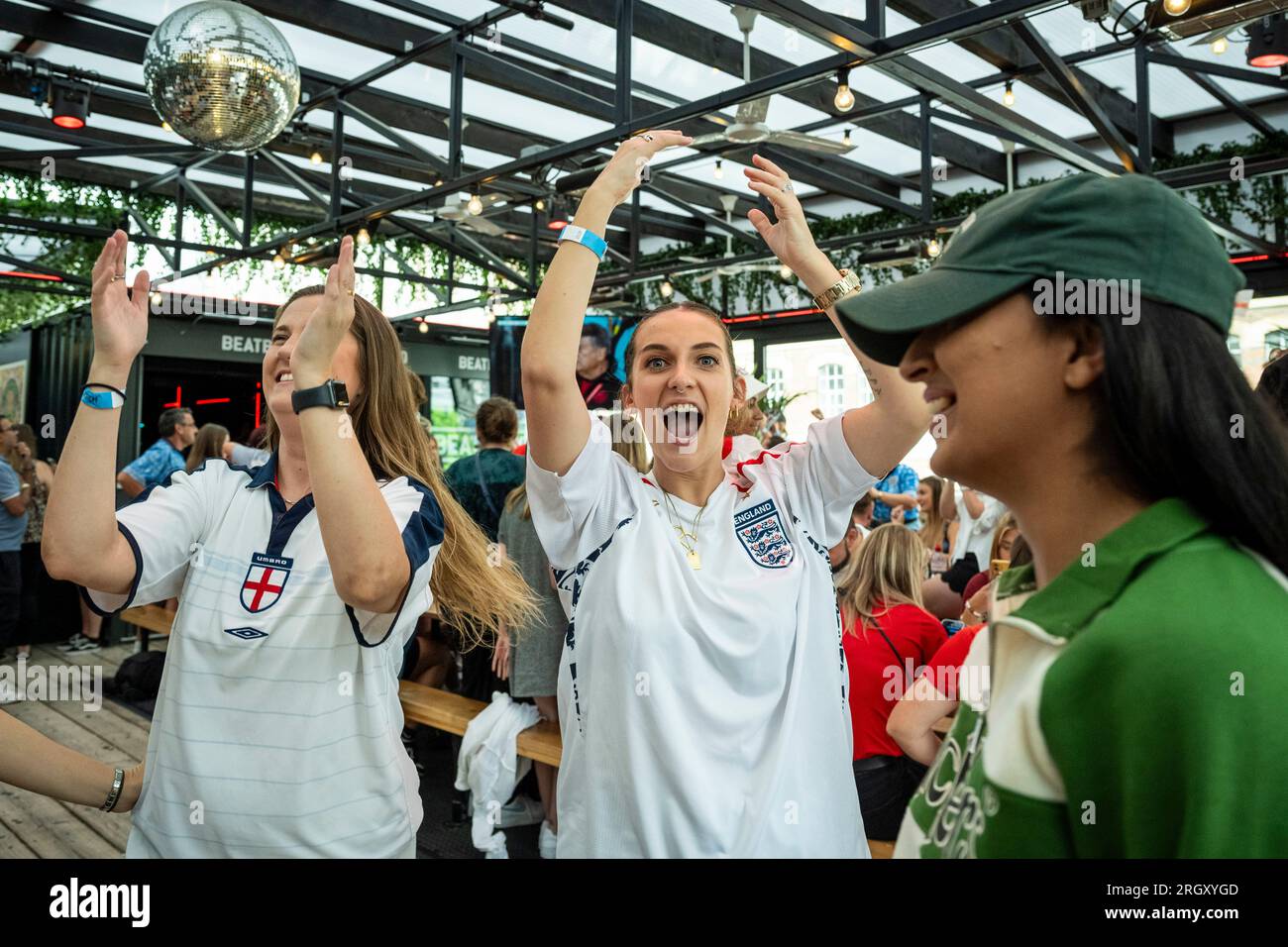 London, UK. 12 August 2023. England fans at BOXPARK in Shoreditch ...
