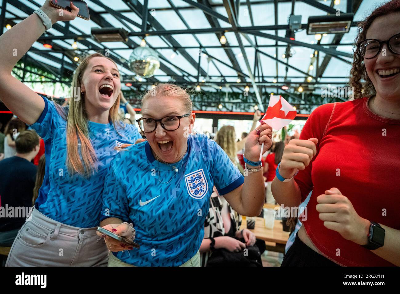 London, UK. 12 August 2023. England fans at BOXPARK in Shoreditch ...
