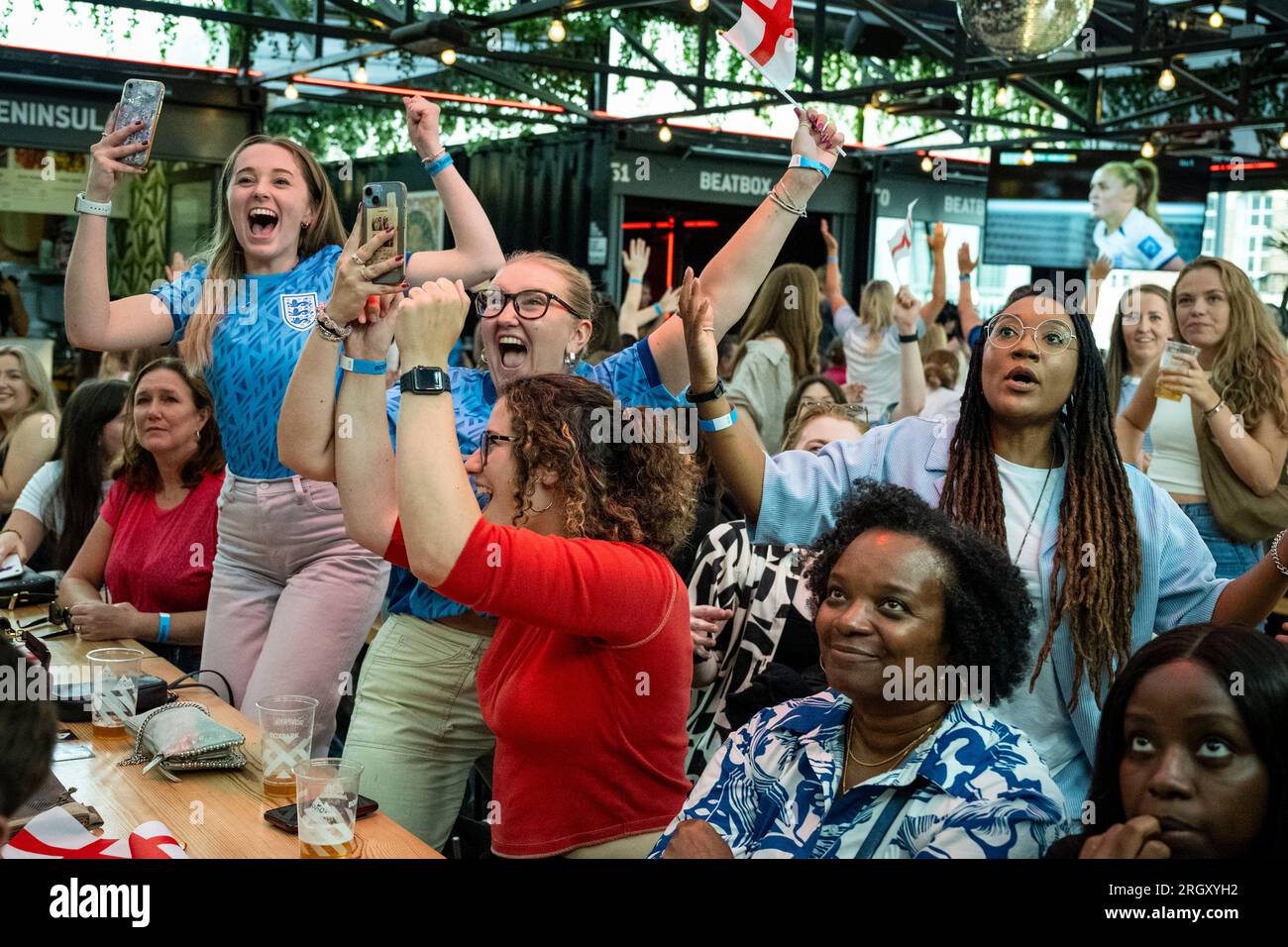 London, UK. 12 August 2023. England fans at BOXPARK in Shoreditch ...